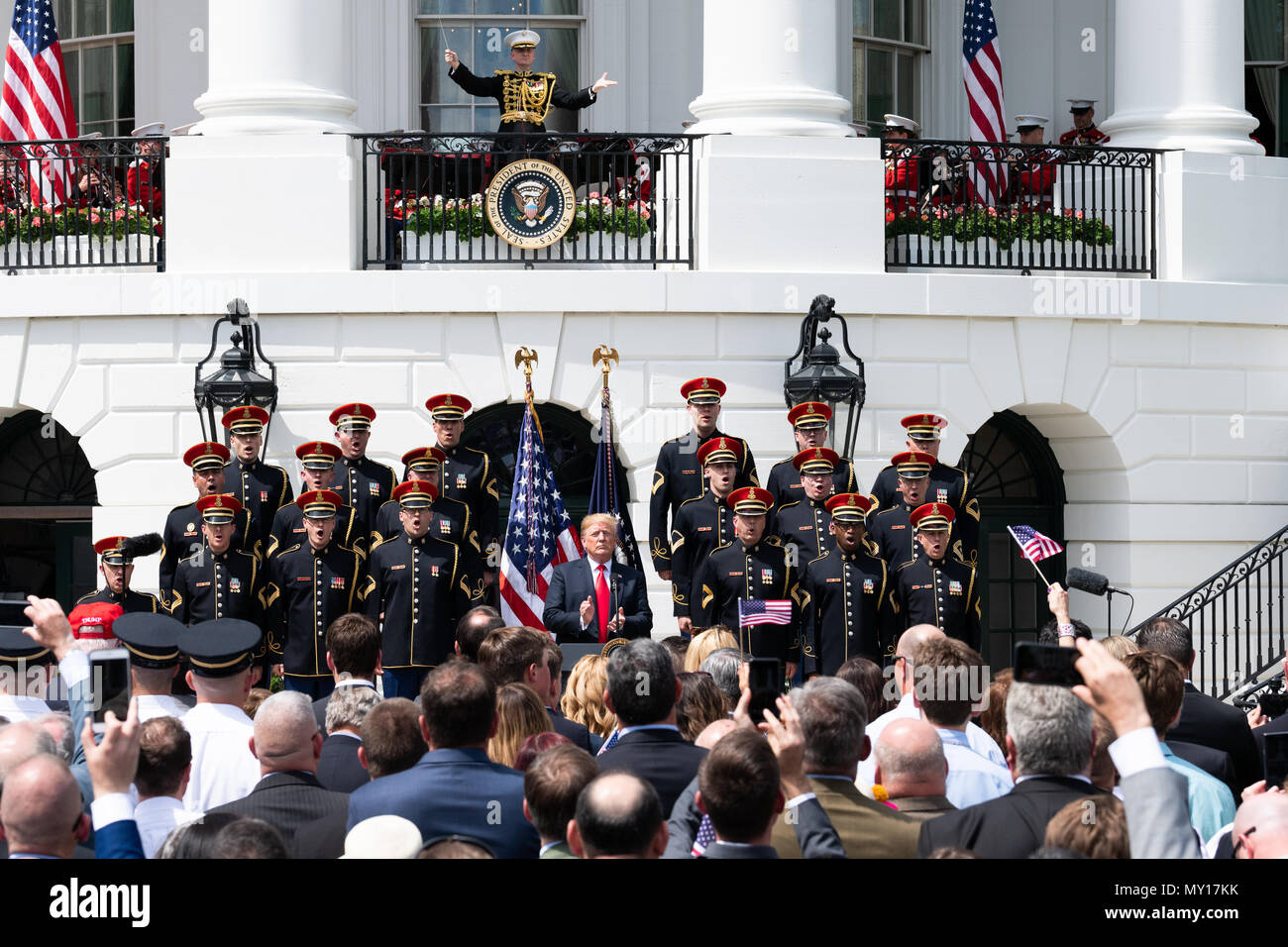 President Donald Trump hosting a celebration of the American flag with ...
