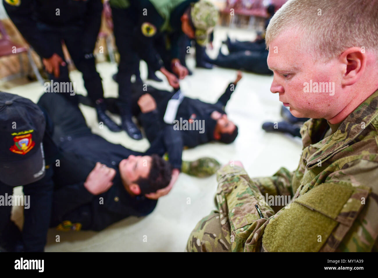 U.S. Army Maj. Jon Wiese, right, 28th Combat Support Hospital emergency ...