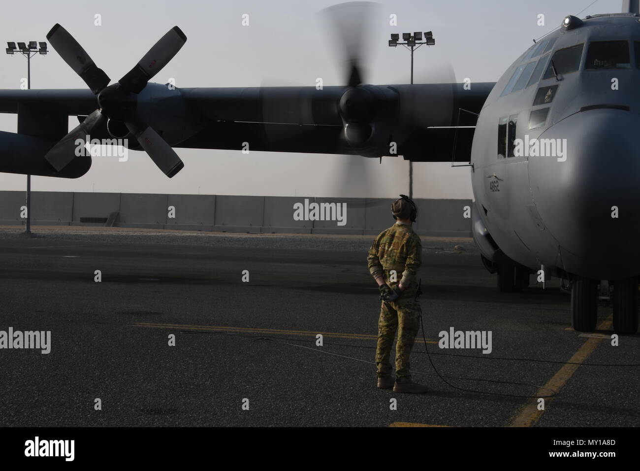 A 386th Air Expeditionary Wing Airman monitors an EC-130H Compass Call ...