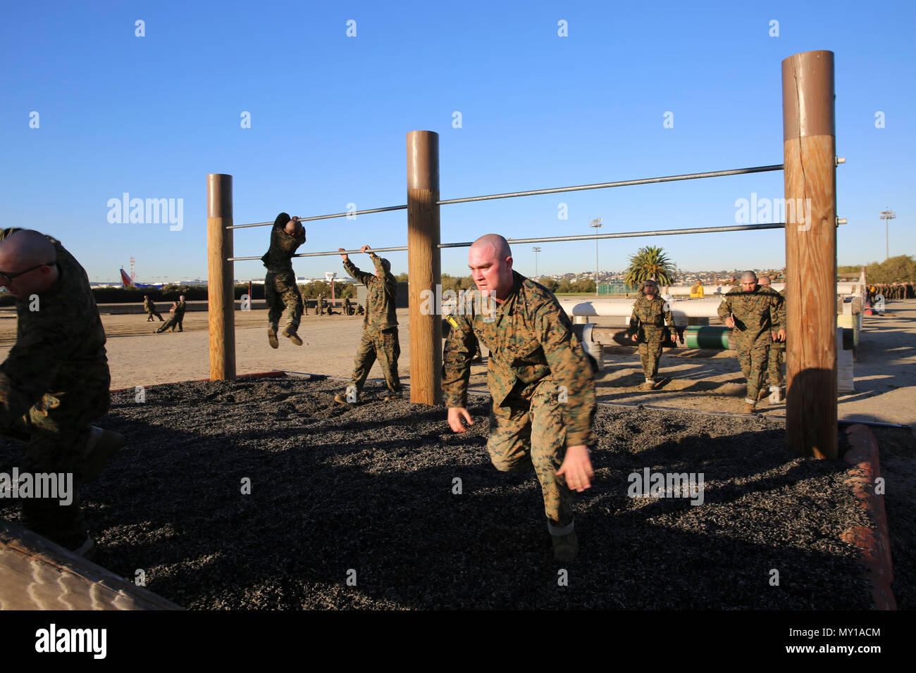 Recruits from Hotel Company, 2nd Recruit Training Battalion, climb over ...