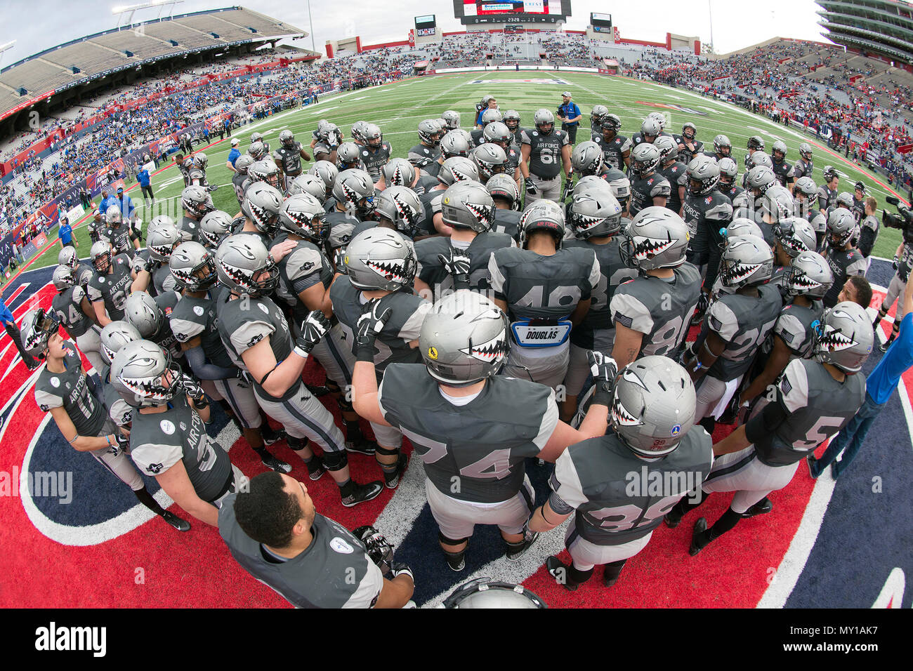 The U.S. Air Force Academy Falcons huddle before meeting the South ...