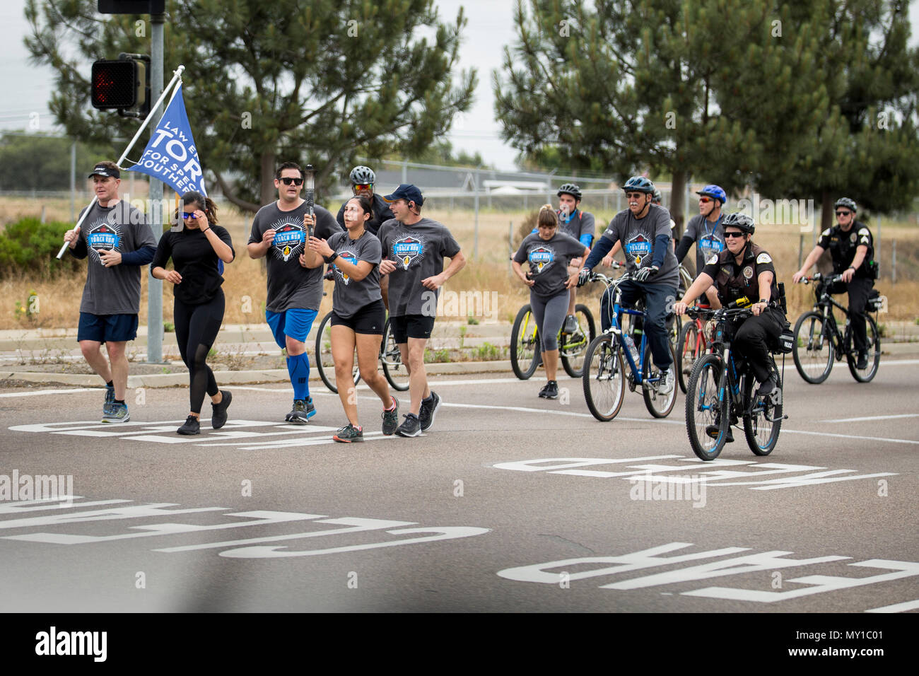 Personnel with Oceanside Police Department prepare to pass the torch to ...