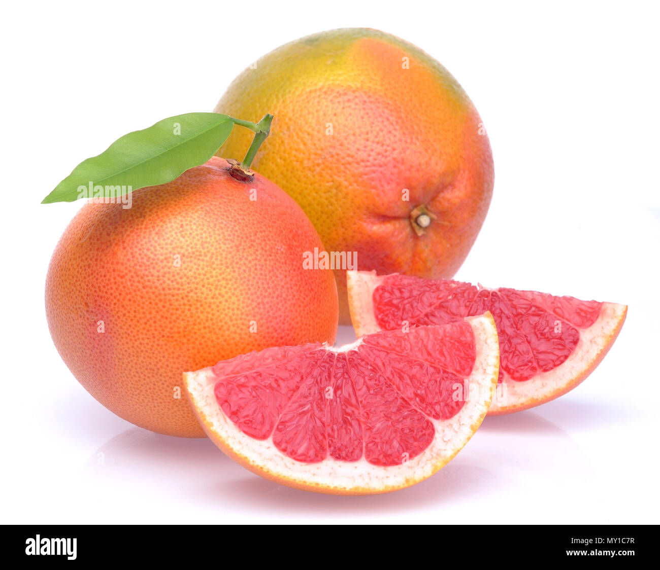 Grapefruit with segments on a white background Stock Photo - Alamy
