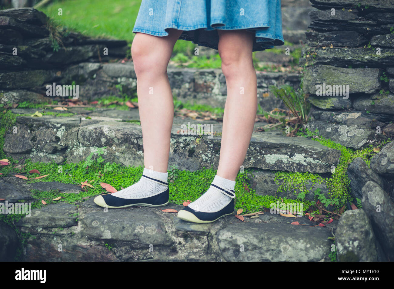 Legs on rocks hi-res stock photography and images - Alamy