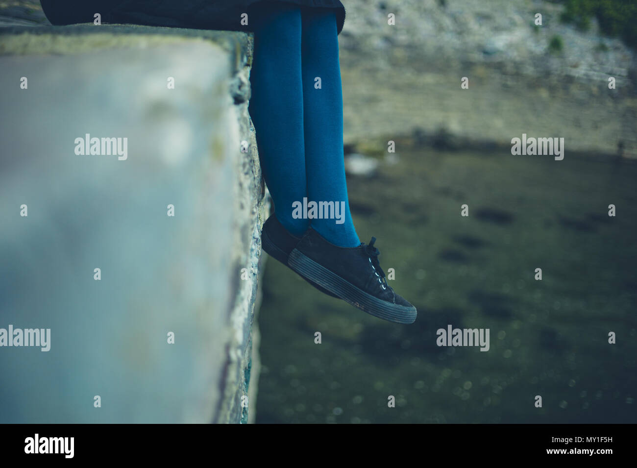 Dangling feet hi-res stock photography and images - Alamy