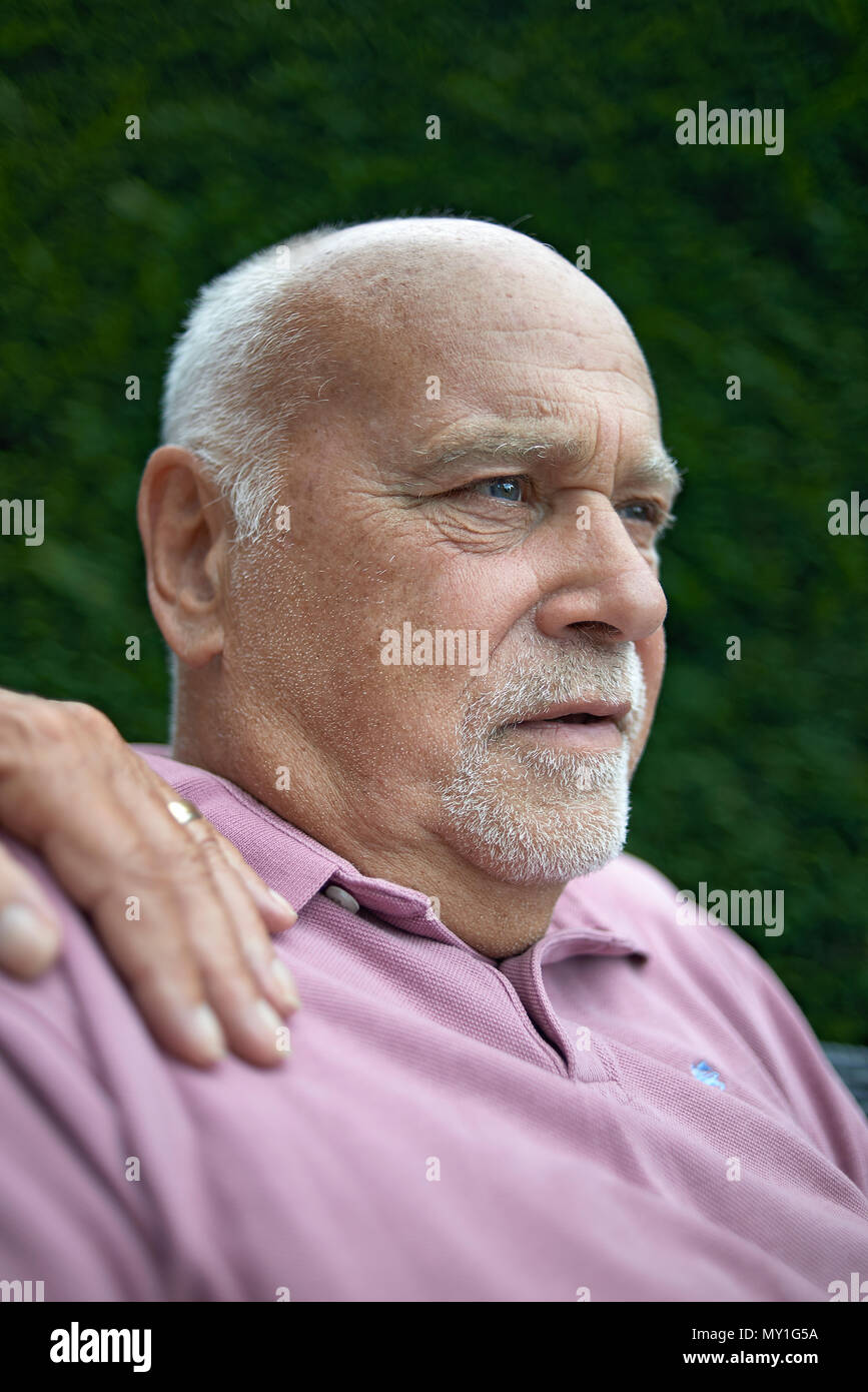 Man Looking Over Shoulder Worried