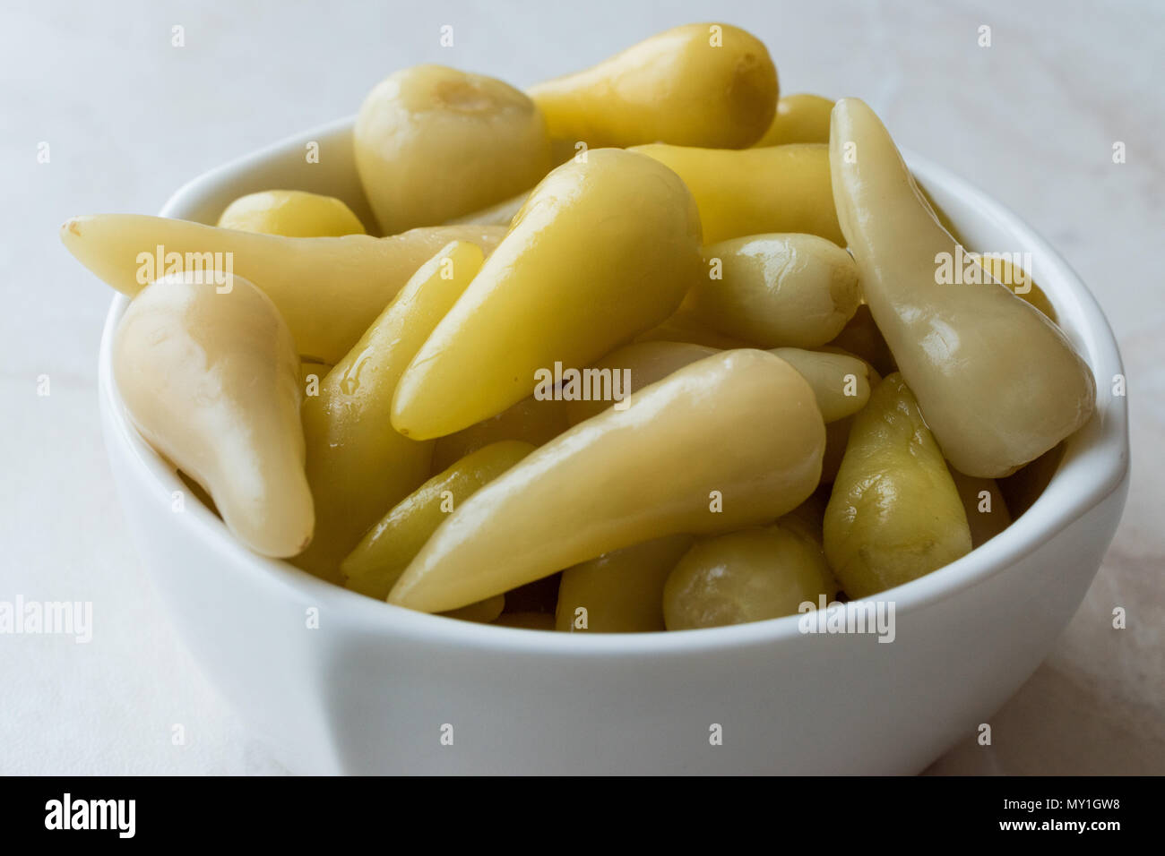 Pickled Green Pepper Pickles in Bowls. Traditional Organic Food Stock ...