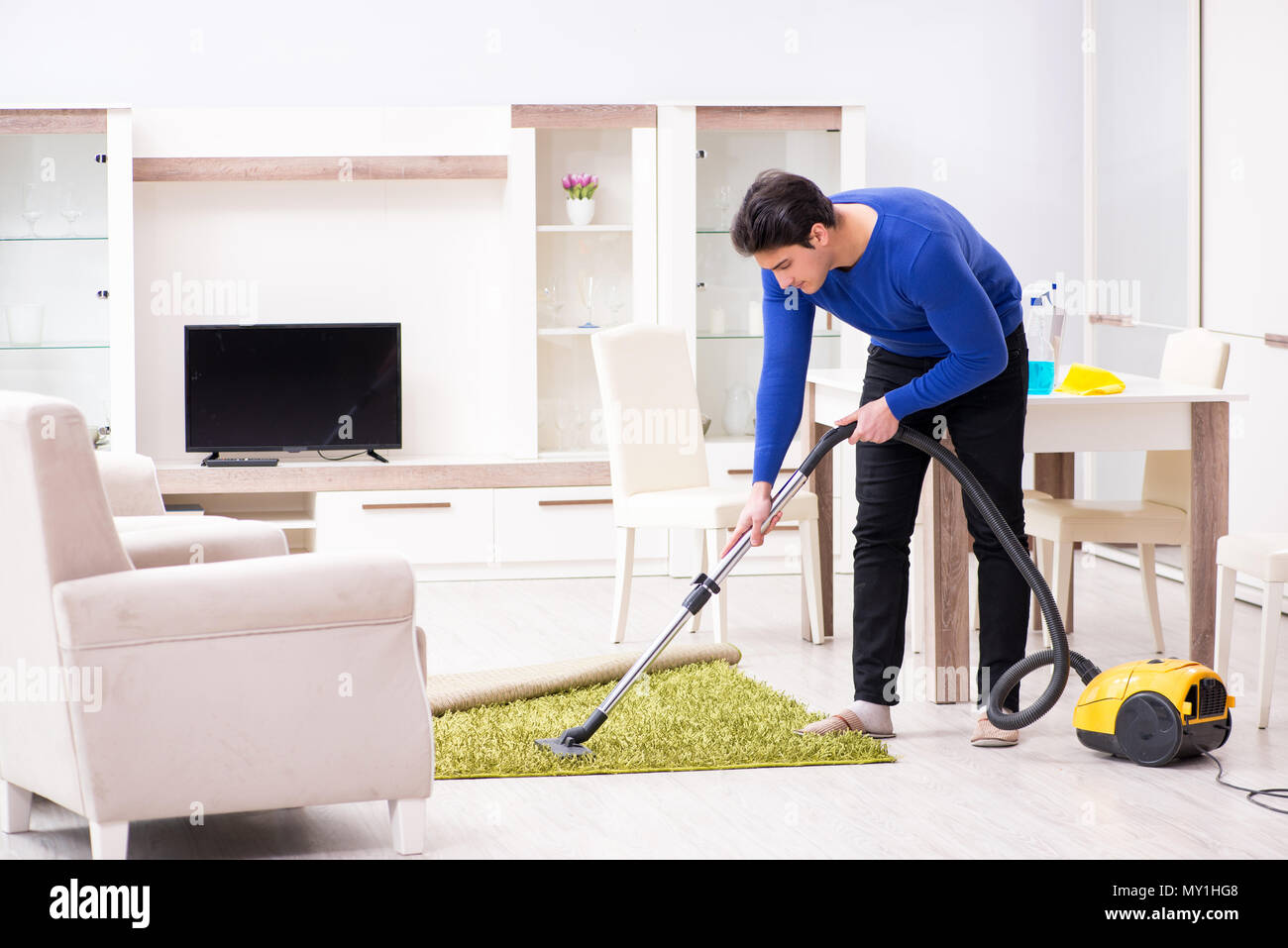 Houseman housekeeping cleaning vacuum cleaner hi-res stock photography ...