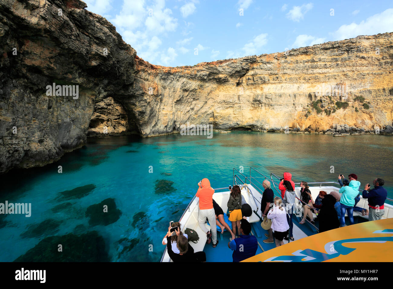 Tourist boat trip along the caves and coast of Comino Island, Malta ...