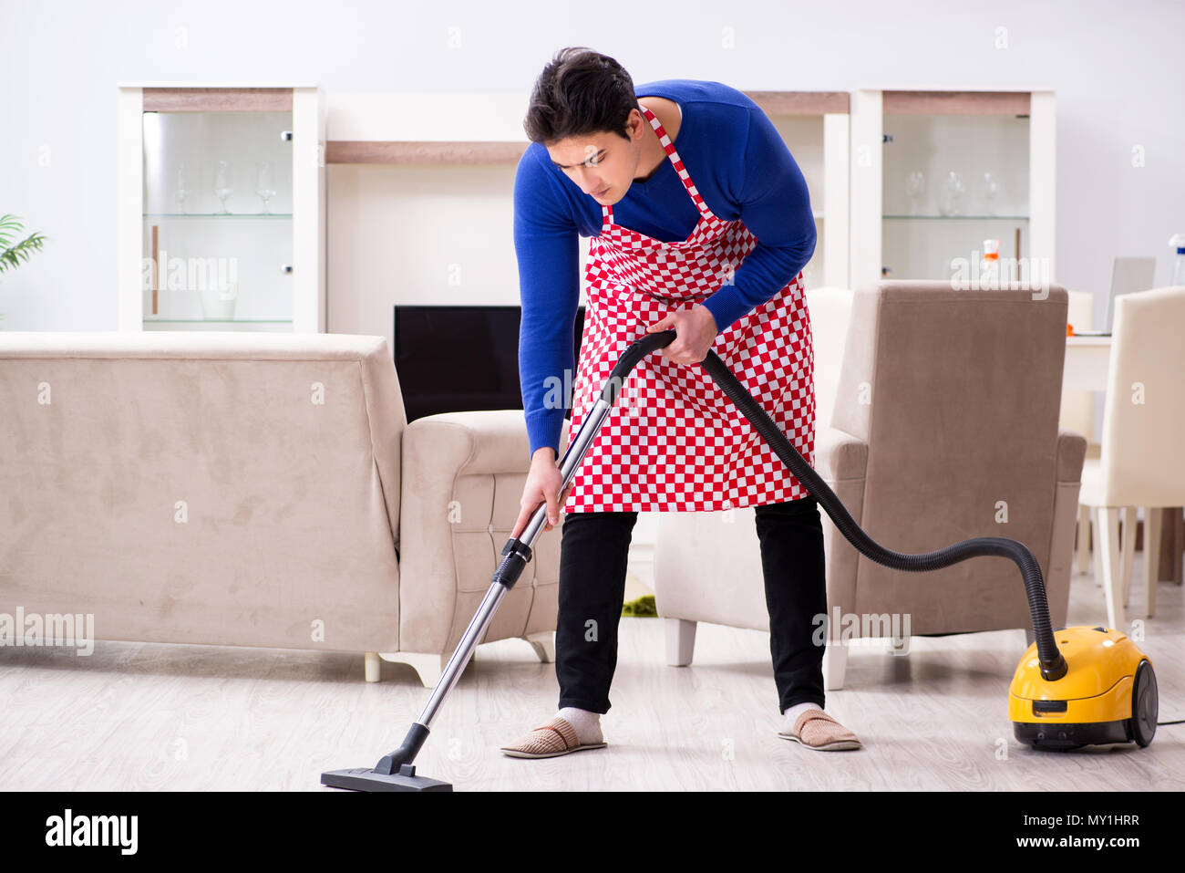 Houseman housekeeping cleaning vacuum cleaner hi-res stock photography ...