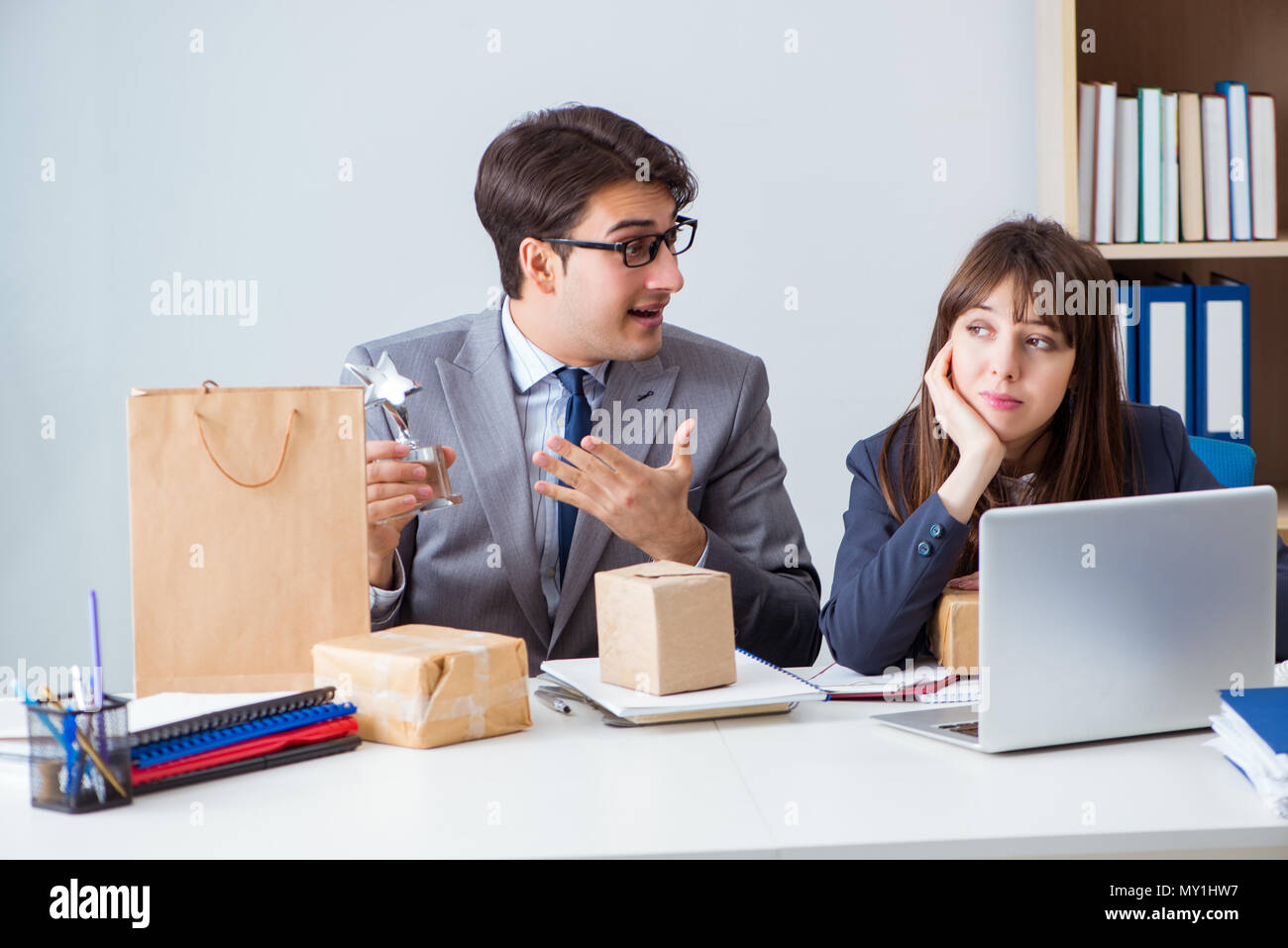 Business people receiving new mail and parcels Stock Photo - Alamy