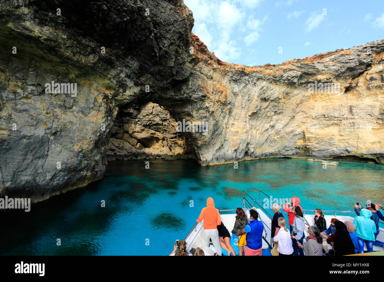 Tourist boat trip along the caves and coast of Comino Island, Malta ...