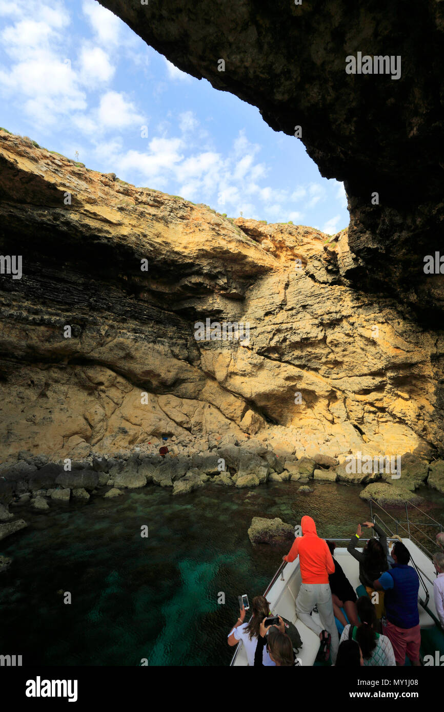 Tourist boat trip along the caves and coast of Comino Island, Malta ...