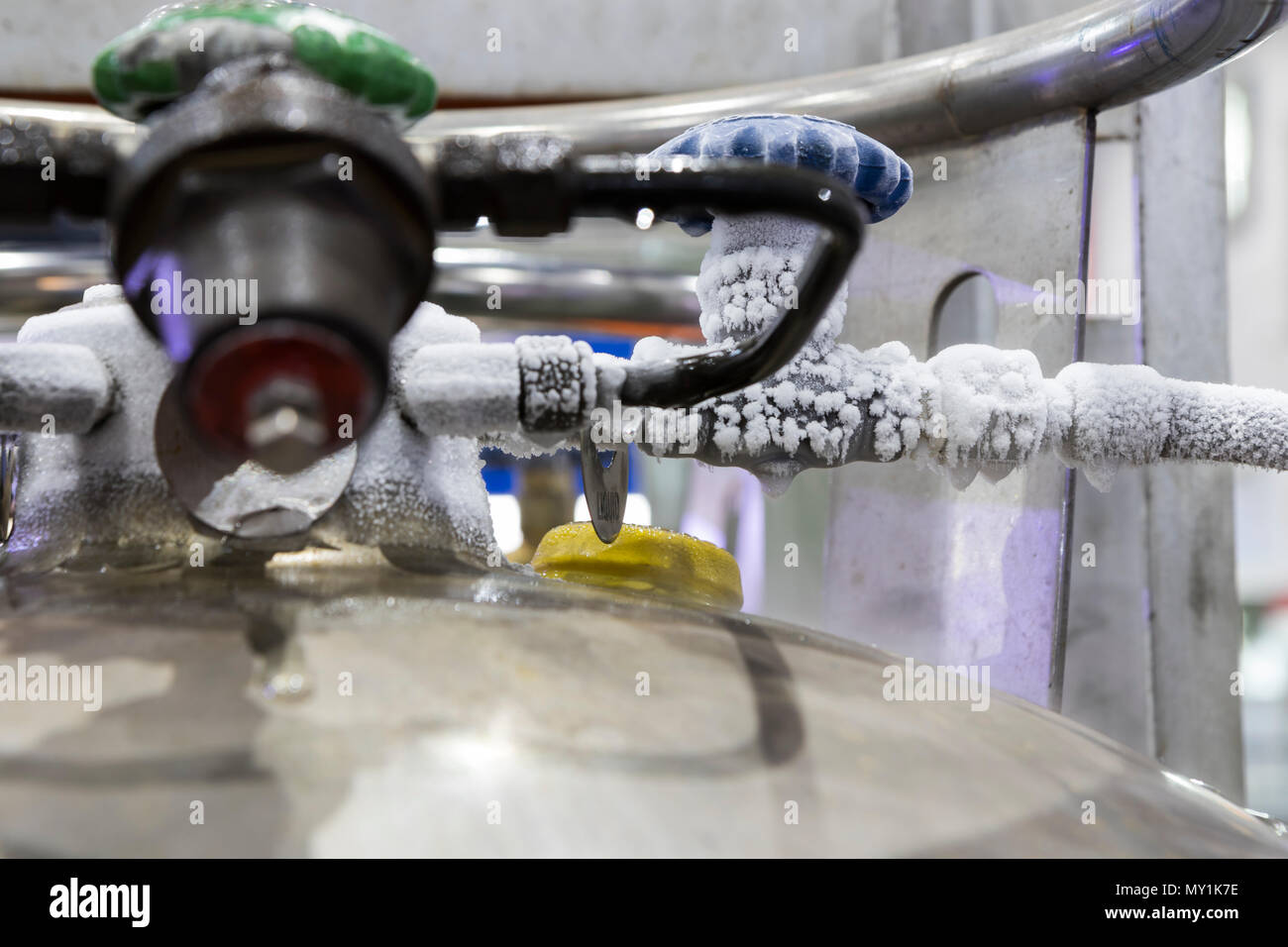 ice at valve and pipe of liquid nitrogen tank ; selective focus Stock ...