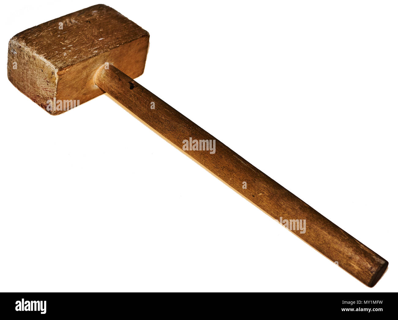 A hammer from a tree lies on an isolated background. The hammer was ...