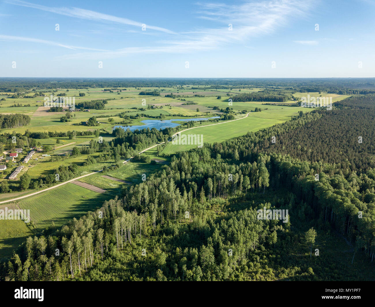 drone image. aerial view of rural area with fields and forests in ...