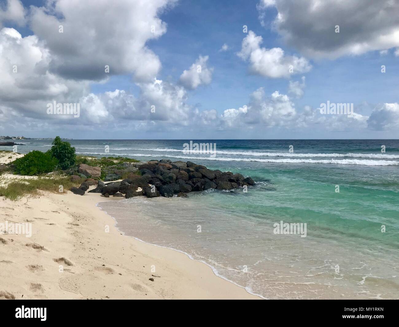 Beautiful panoramic view of an scenic untouched sand beach in Barbados ...