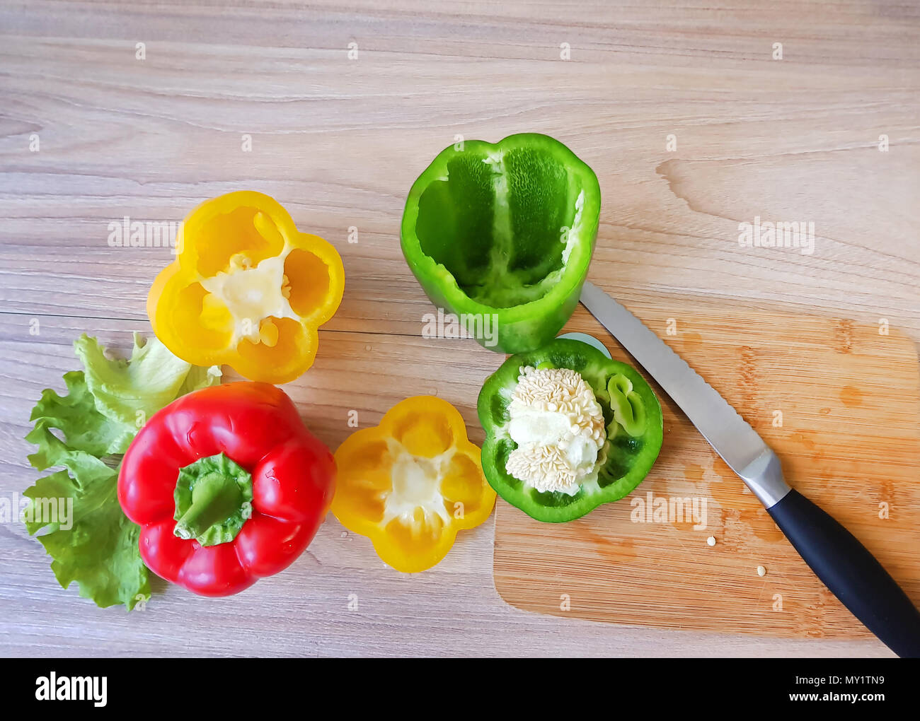 Fresh and sweet bell pepper on wood table prepare to cooking top view ...