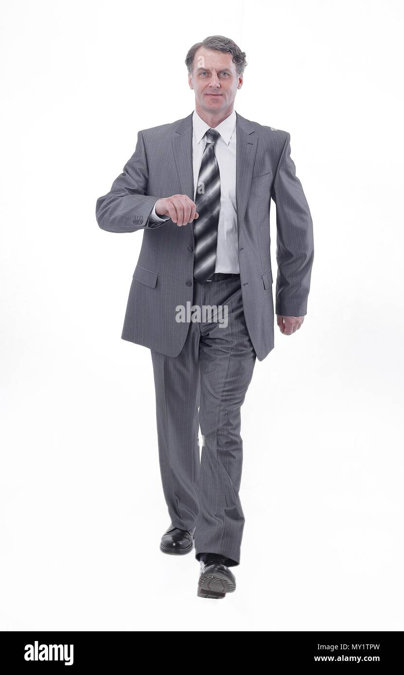 in all growth.a successful businessman, confidently striding forward ...