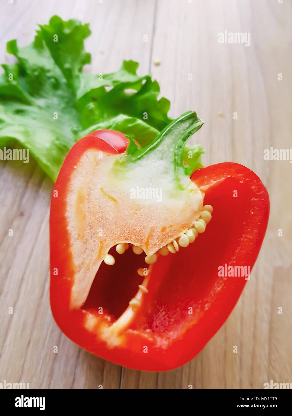 Red peppers on wood table background, Fresh red bell pepper (capsicum ...