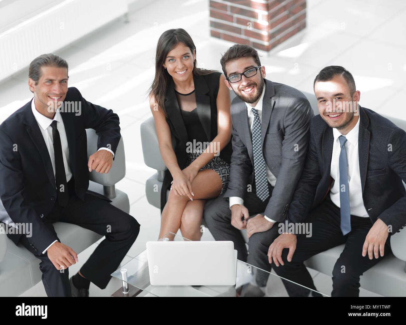 Office workers talking in lobby hi-res stock photography and images - Alamy