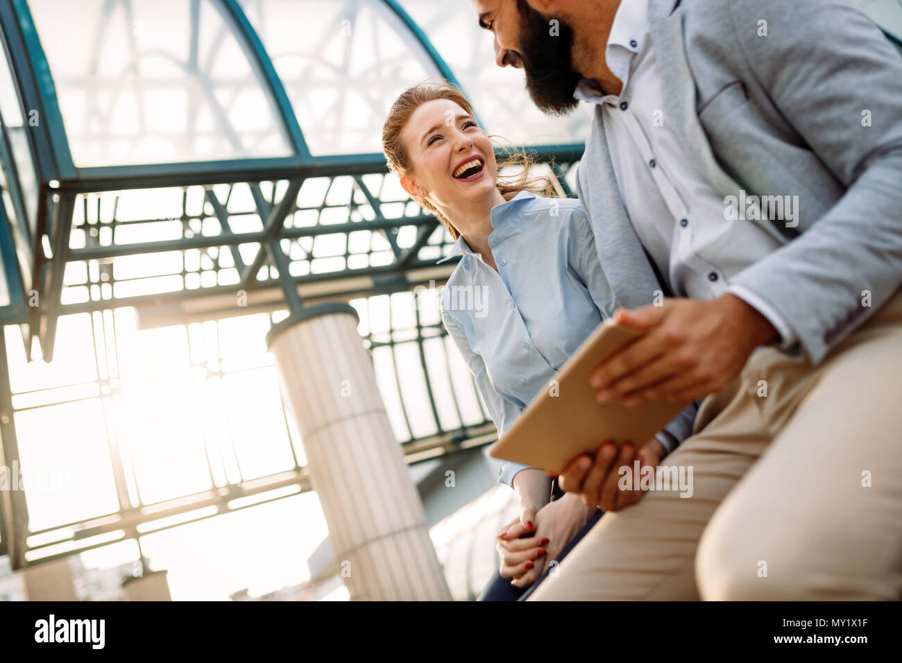 Business people discussing ideas outside Stock Photo - Alamy