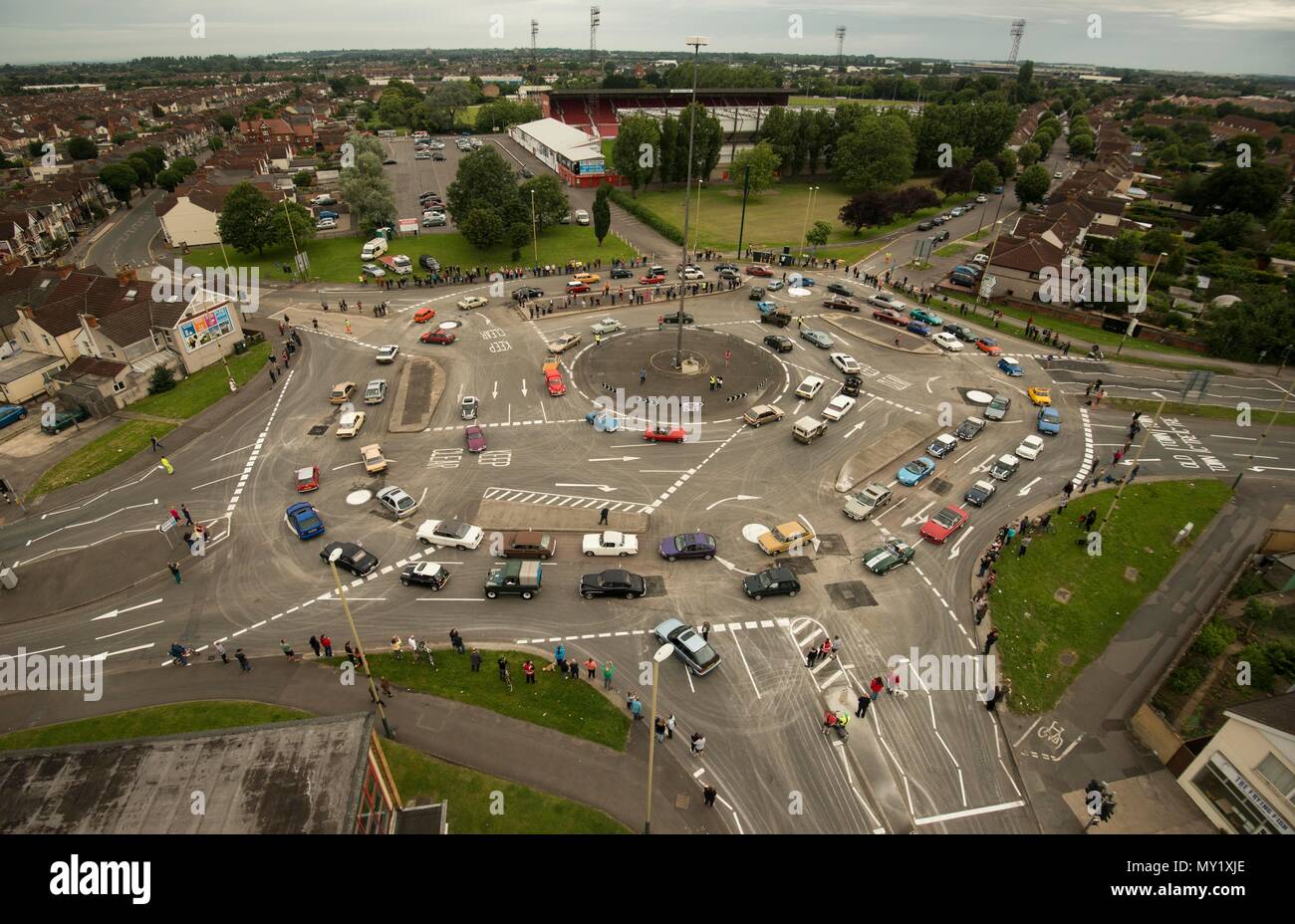 Collection of 60 classic cars parade around the Magic Roundabout ...
