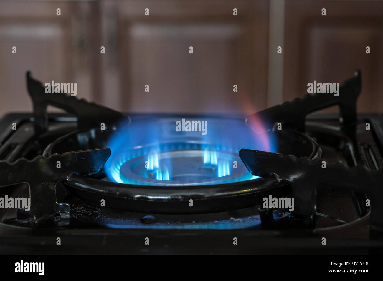 Lit blue gas stove hi-res stock photography and images - Alamy