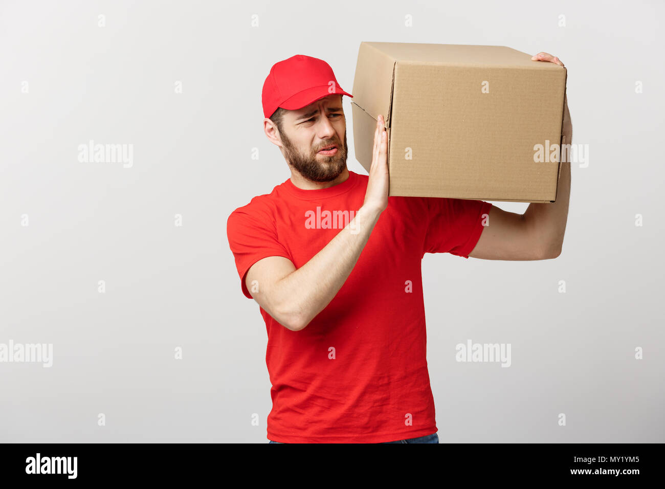 Delivery Concept: handsome Delivery man with boxes, delivery, courier ...