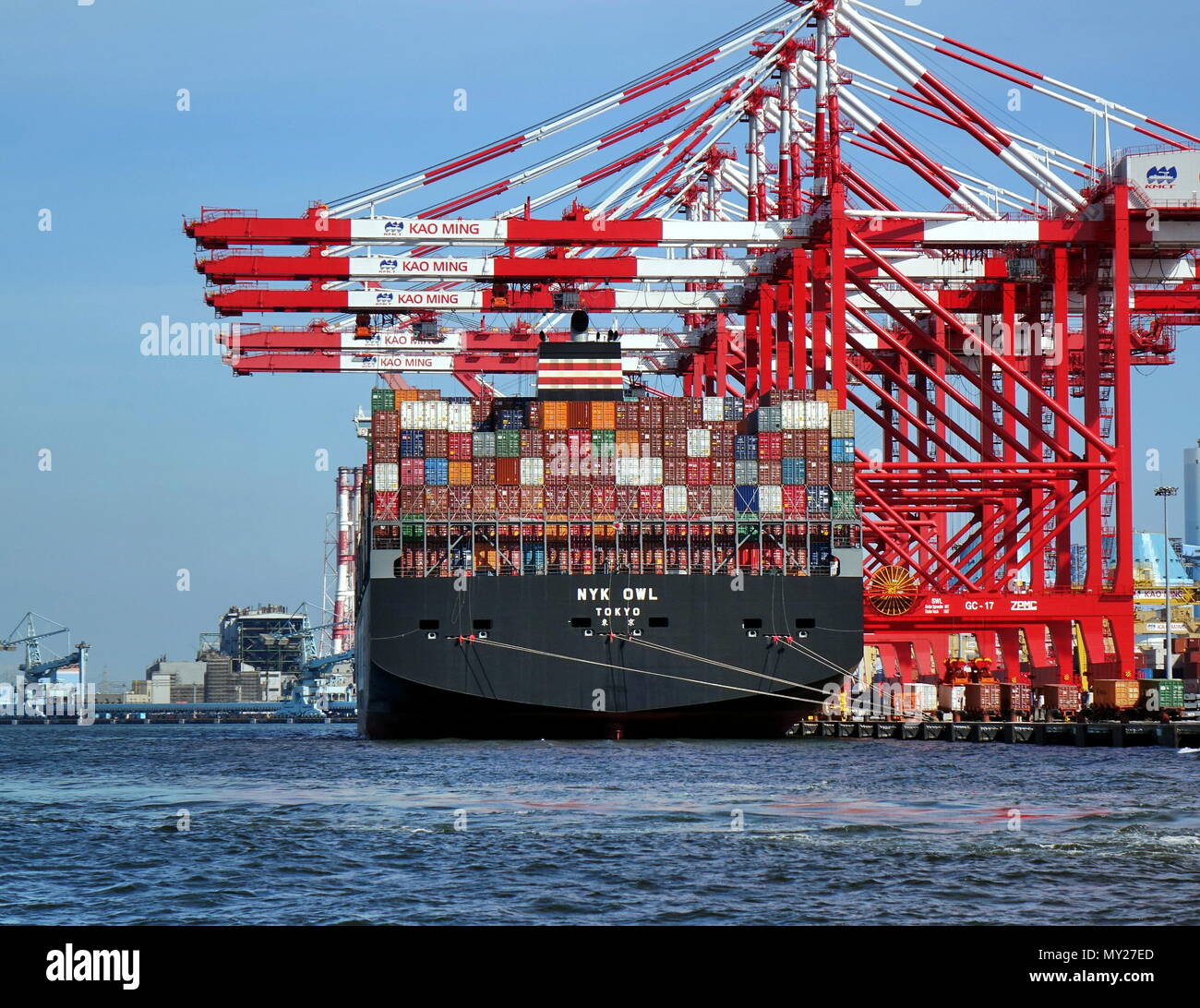 KAOHSIUNG, TAIWAN -- MAY 26, 2018: A large container ship is being ...