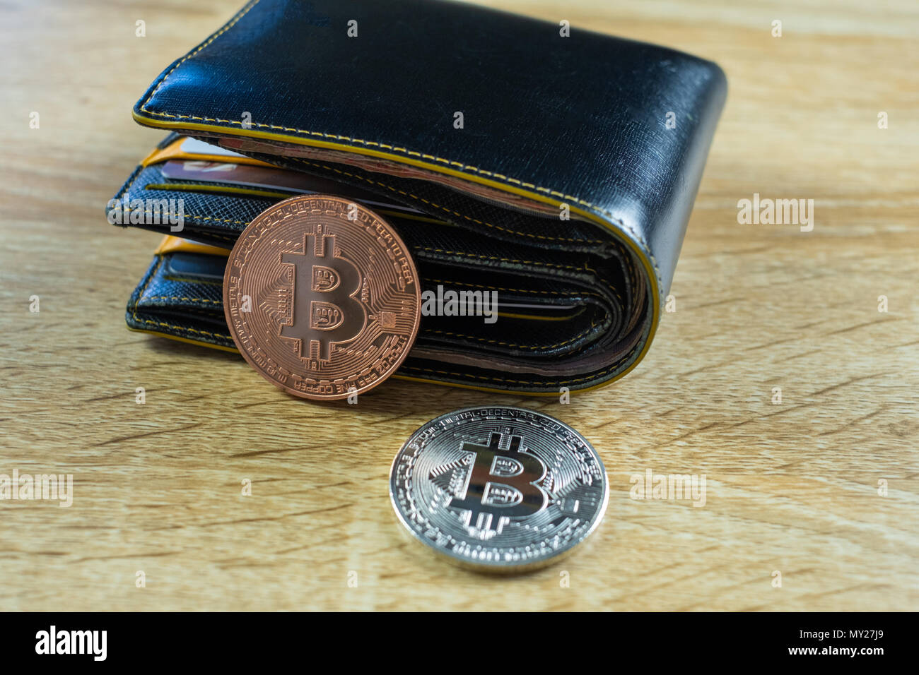 Bitcoin digital currency instead real money, bit-coin with leather ...