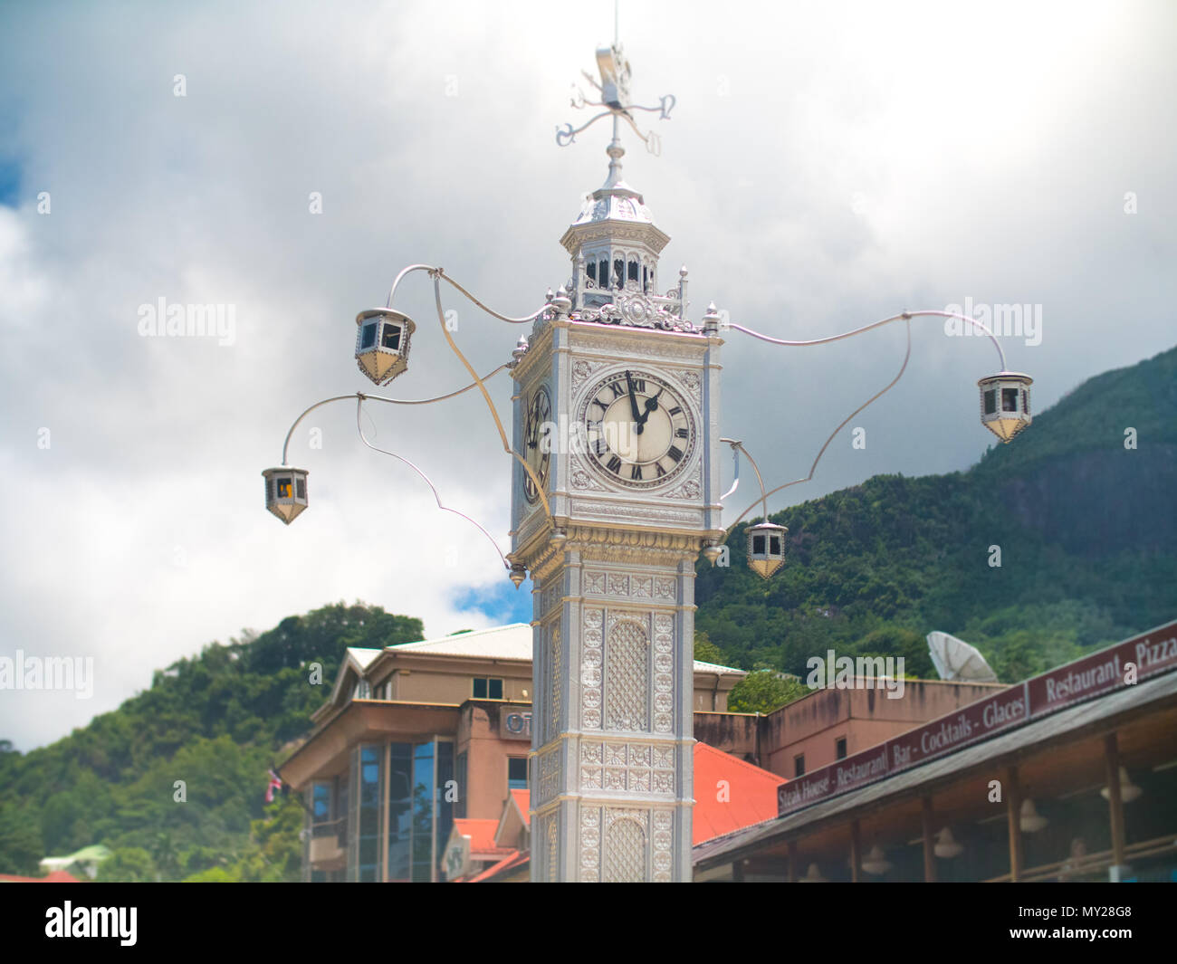 Victoria Clock Tower in Victoria, Seychelles. Bright but cloudy day ...