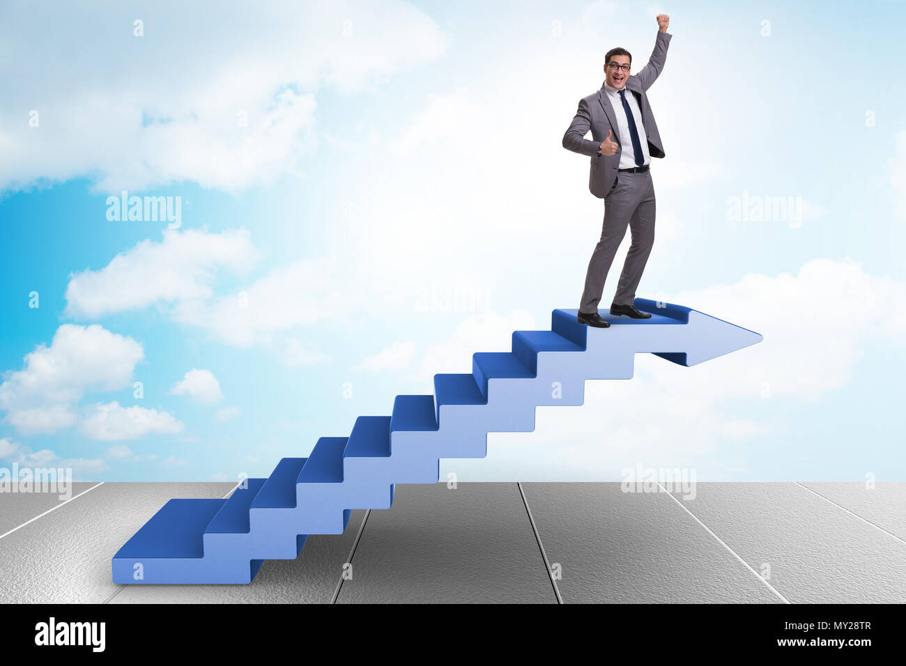 Businessman climbing career ladder in business concept Stock Photo - Alamy