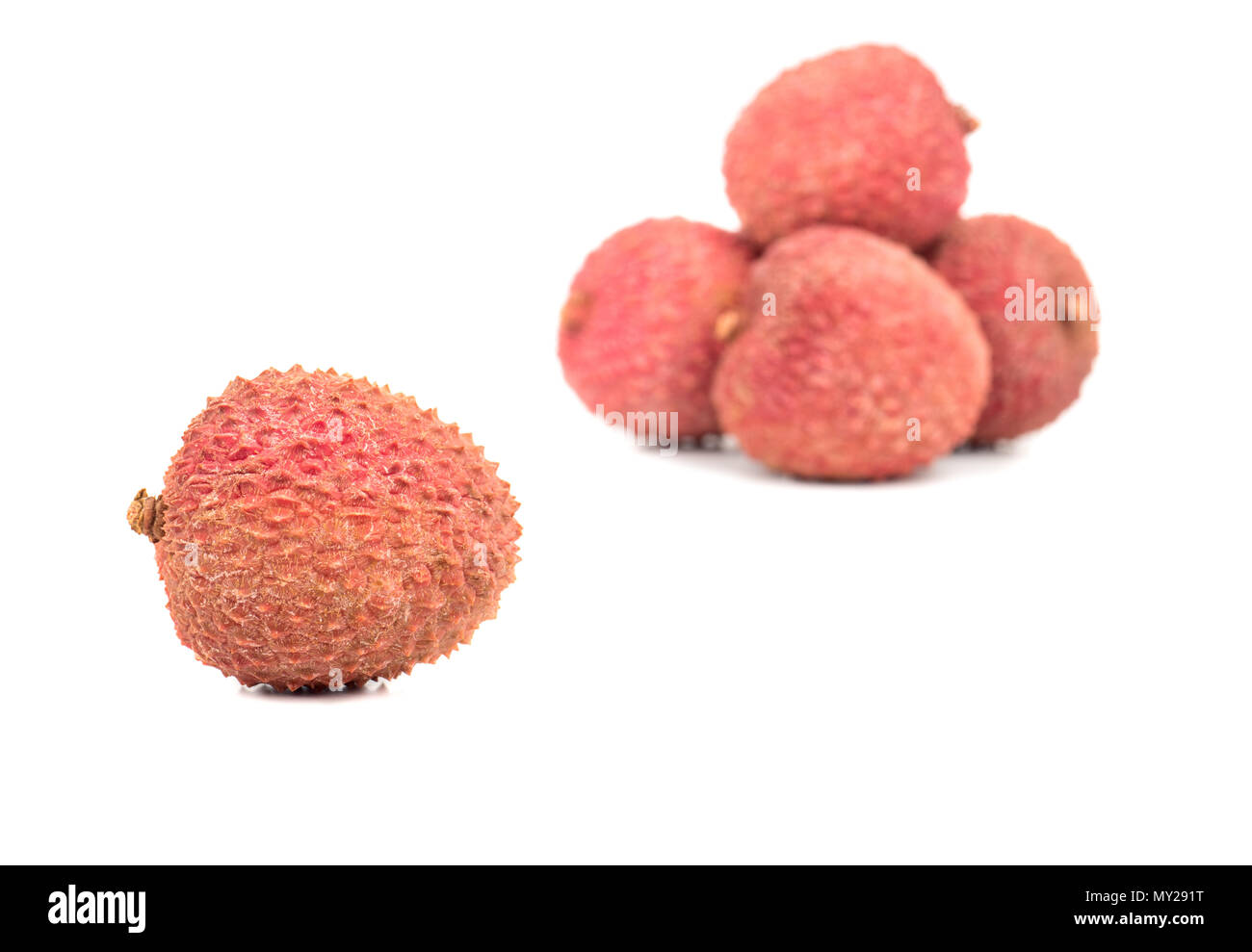 Fresh fruit lychee in the shell on white background Stock Photo - Alamy