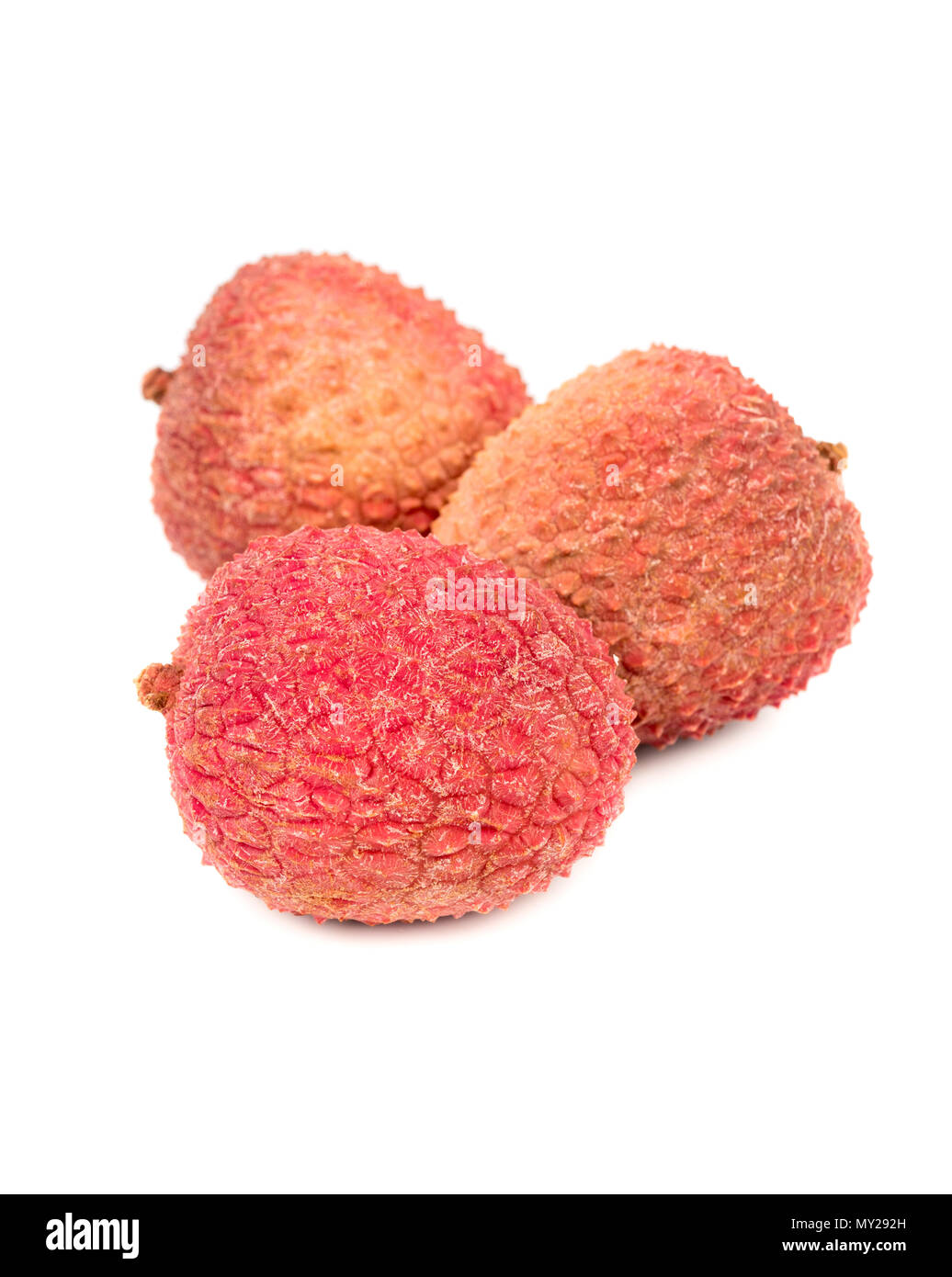Three ripe lychee fruit in shell on white background Stock Photo - Alamy