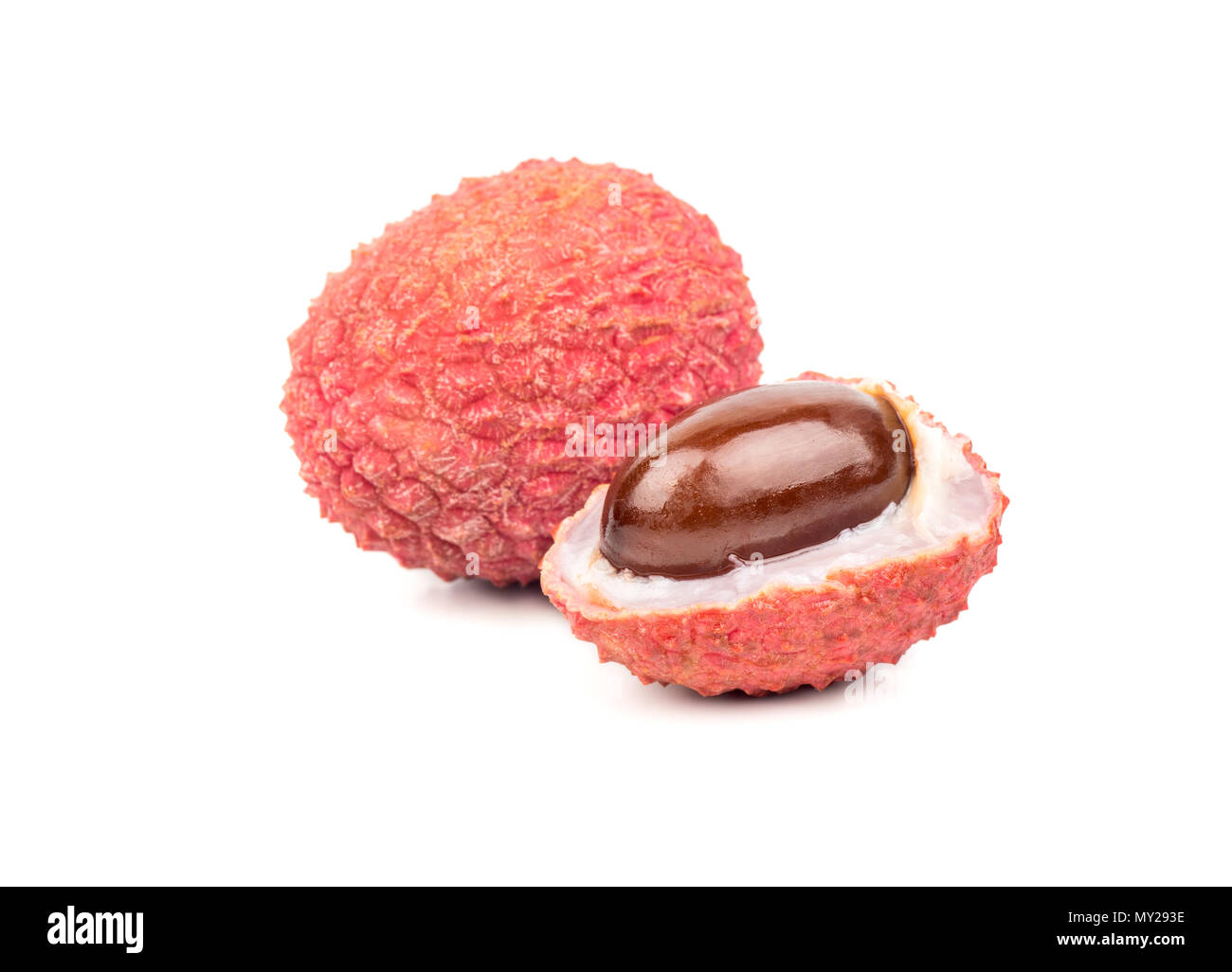 Lychee fruit in the shell with a juicy half on white background Stock ...