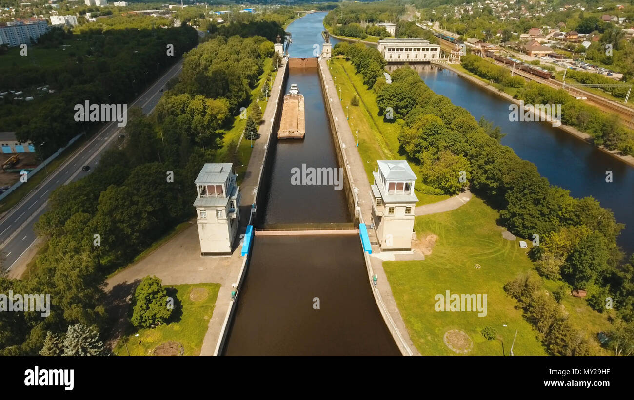 Sluice Gates on the River. Aerial view barge, ship in the river gateway ...