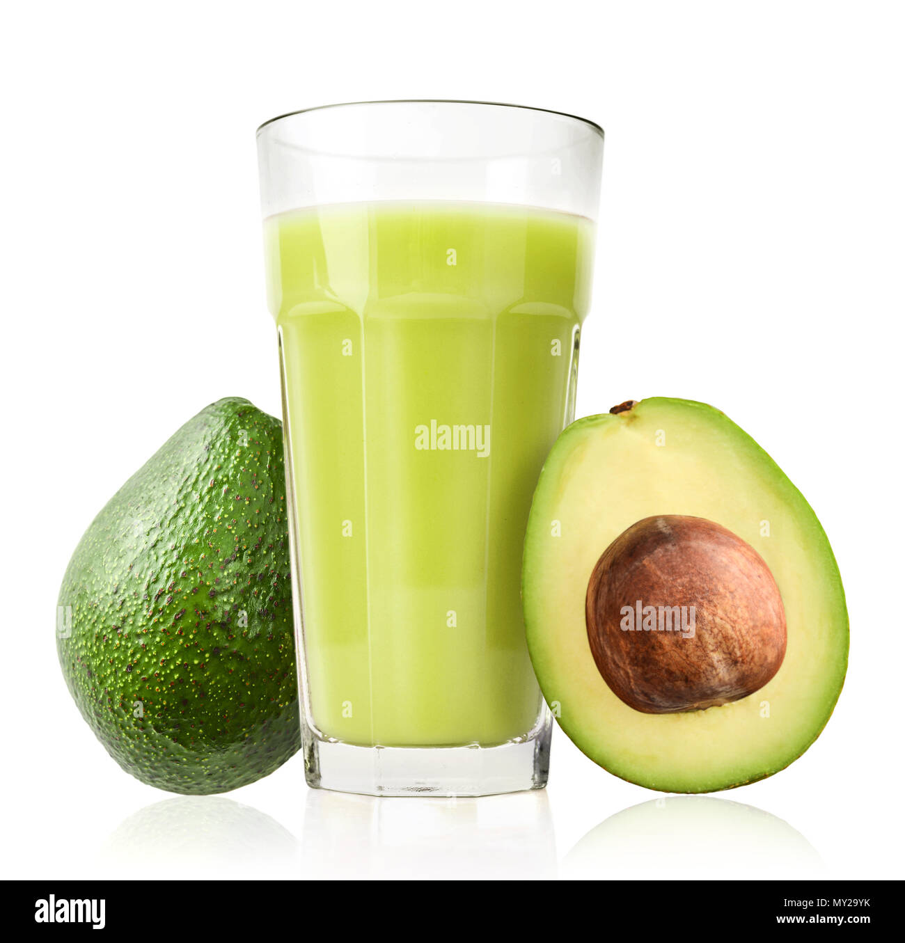 Glass of Avocado Smoothie with avocado fruit isolated on white ...