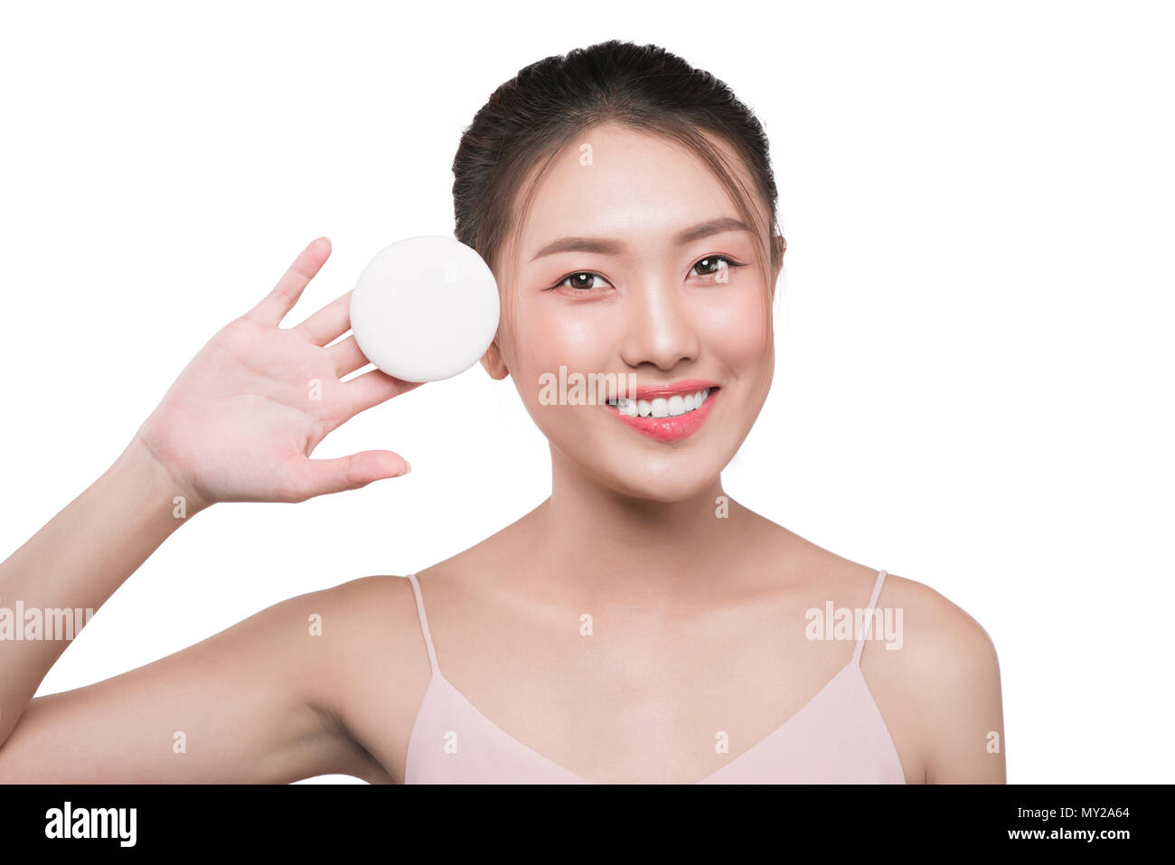 Cute girl with black hair holding powder puff. Skin care concept Stock ...