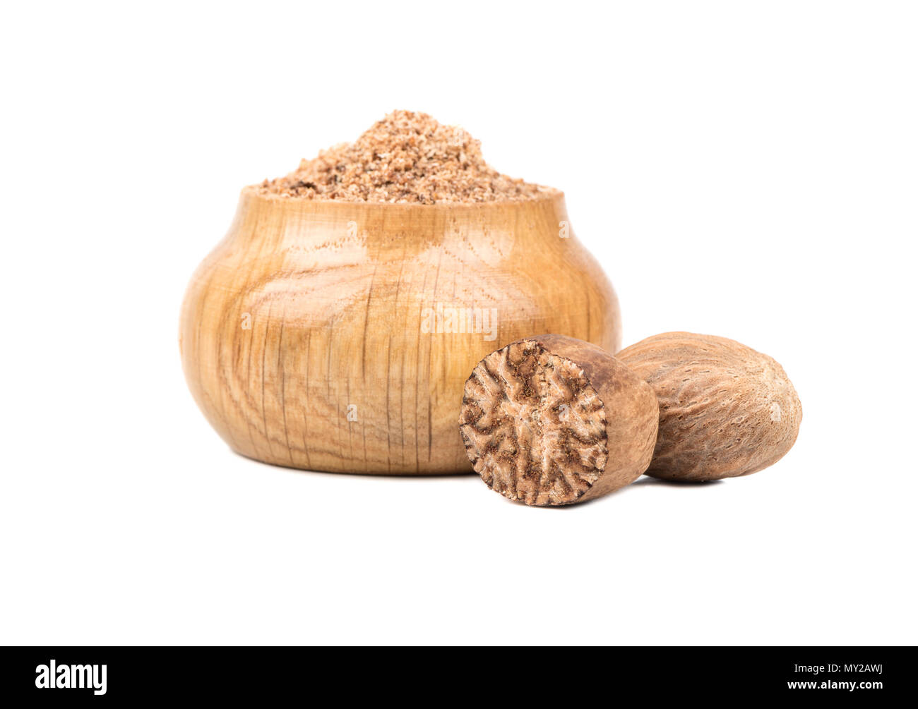 Nutmeg in a wooden jar for spice isolated on a white background Stock ...