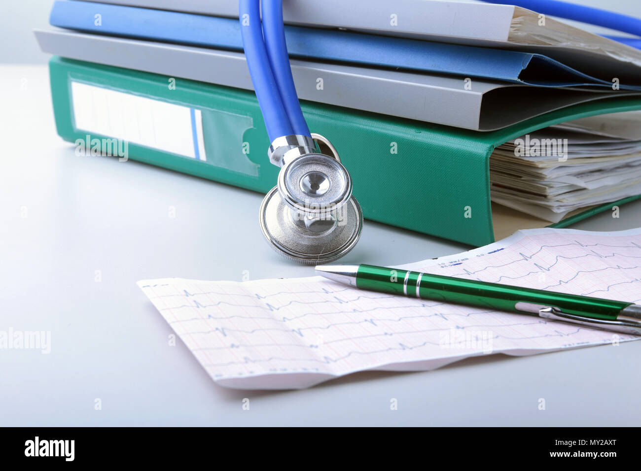 books folder file, stethoscope and RX prescription isolated on white ...