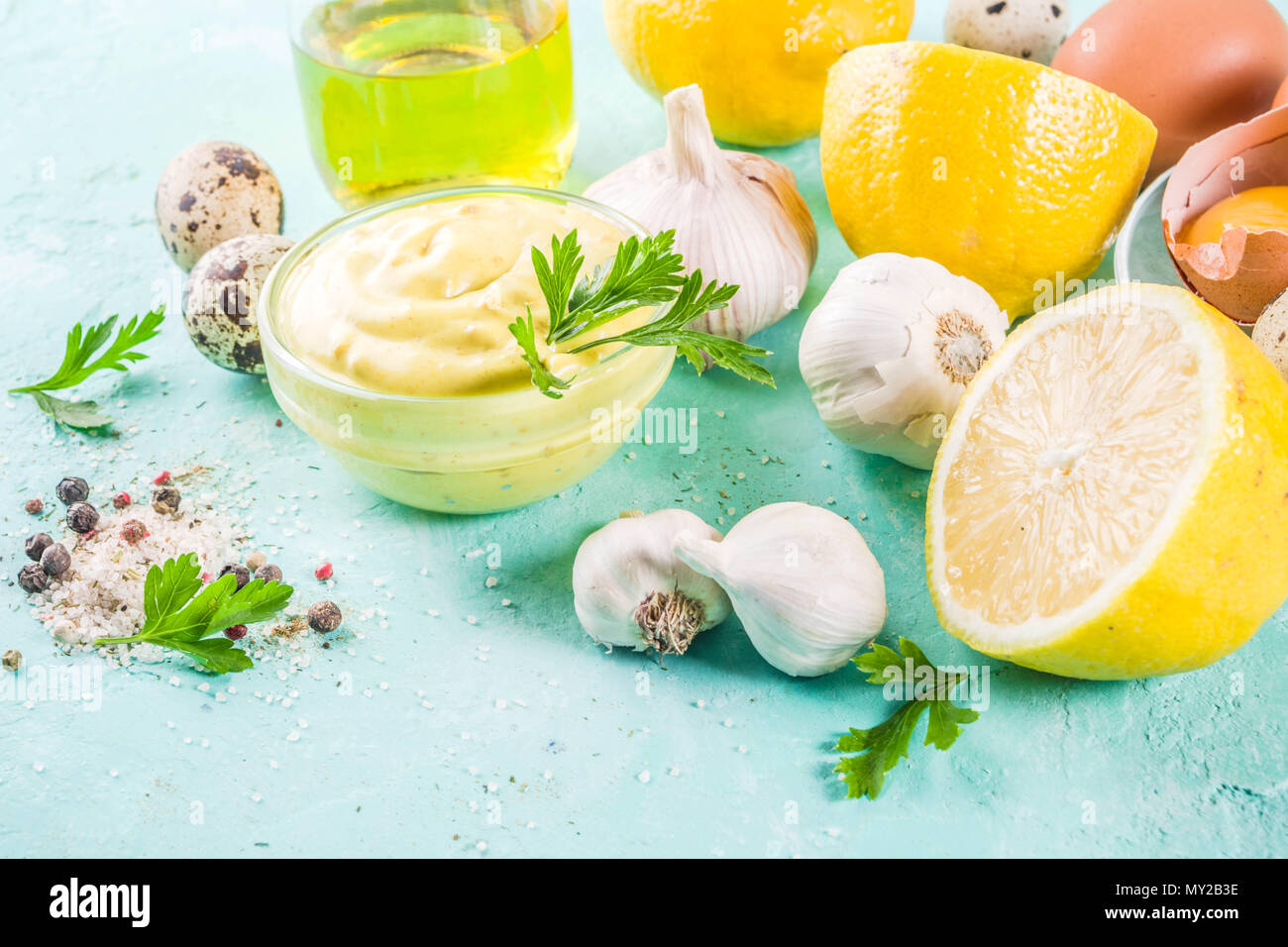 Homemade mayonnaise sauce with ingredients - lemon, eggs, olive oil ...