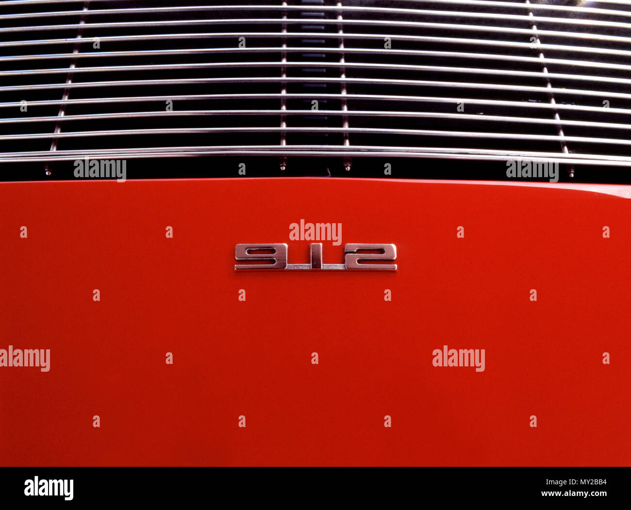 A detailed close up rear end view of the boot lid and engine grill of a ...