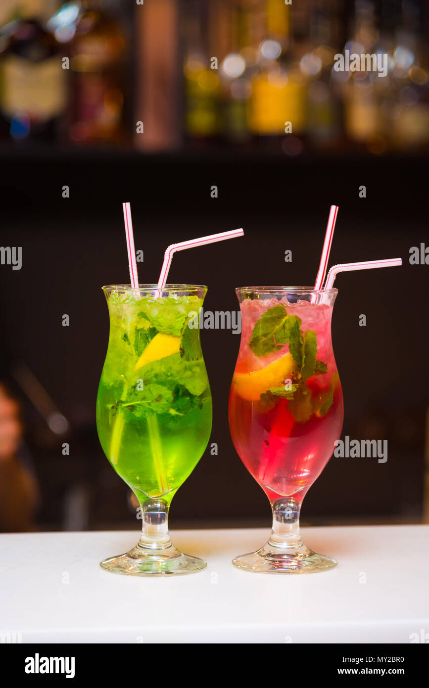 Two bright colorful cocktails in the bar Stock Photo - Alamy