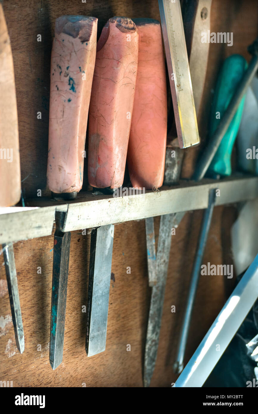 Set of old rasps on a shelf in the garage Stock Photo - Alamy