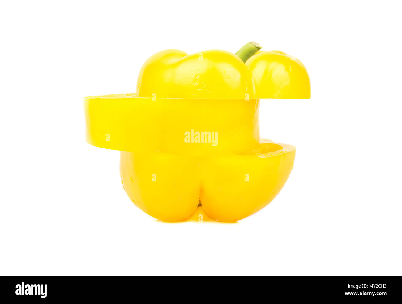 Fresh yellow pepper cut into three pieces on white background Stock ...