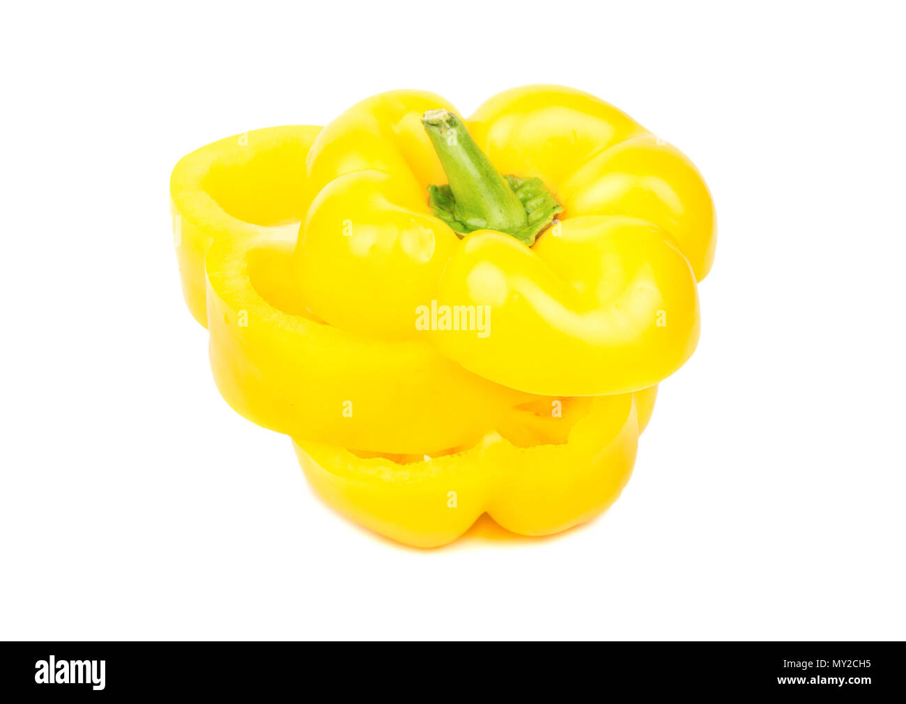 Fresh yellow pepper cut into three pieces on white background Stock ...