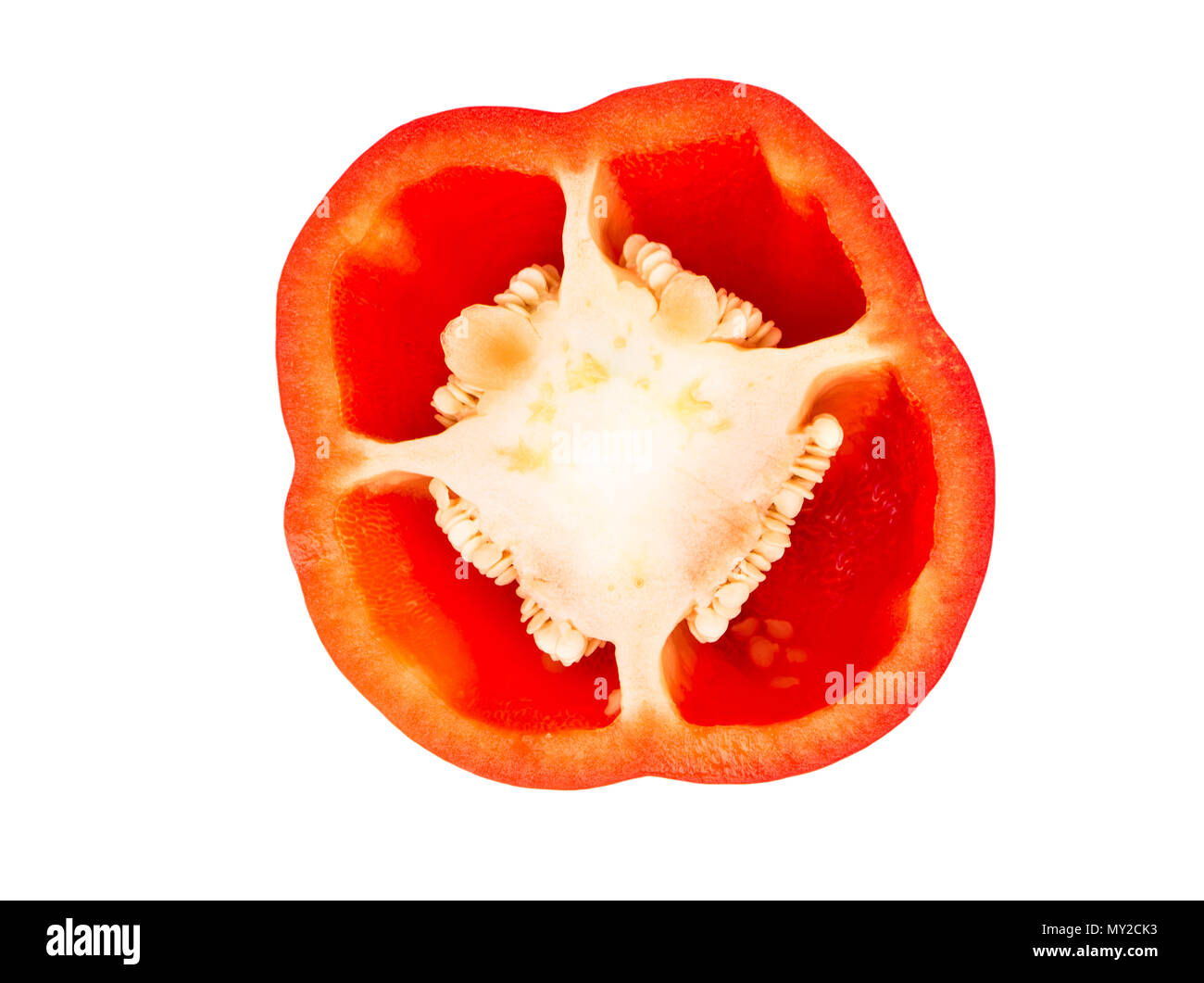 Cut half of a fresh red pepper on white background, top view Stock ...
