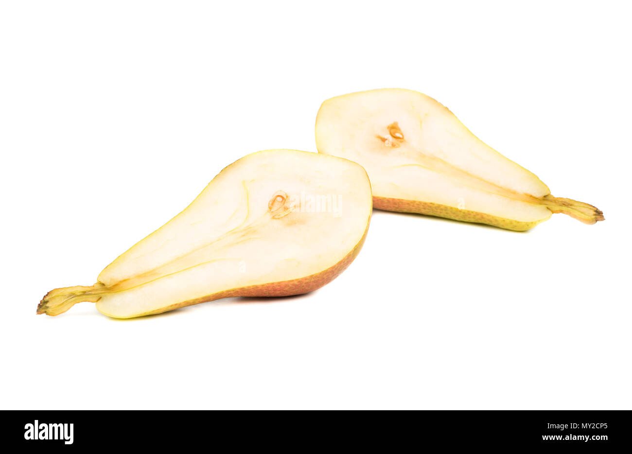 Two halves of fresh pear on white background Stock Photo - Alamy