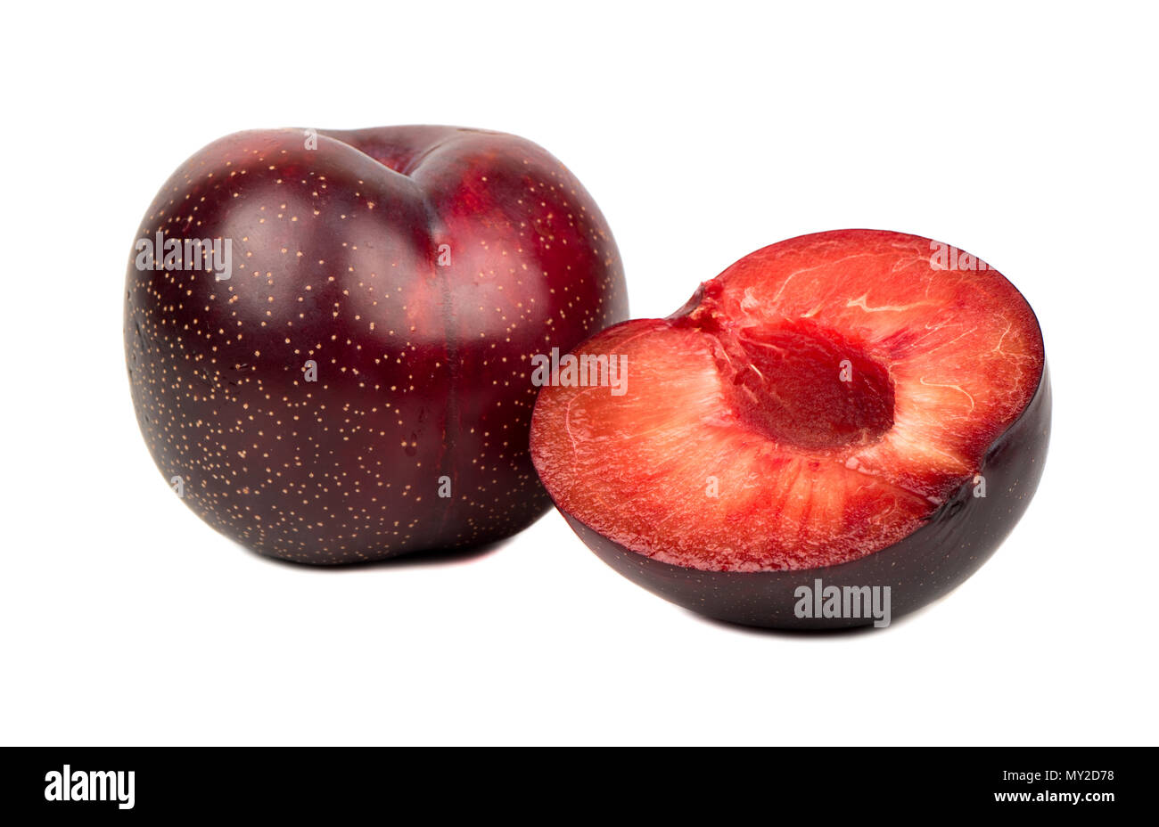 Fresh big red plum with a juicy half on white background Stock Photo ...